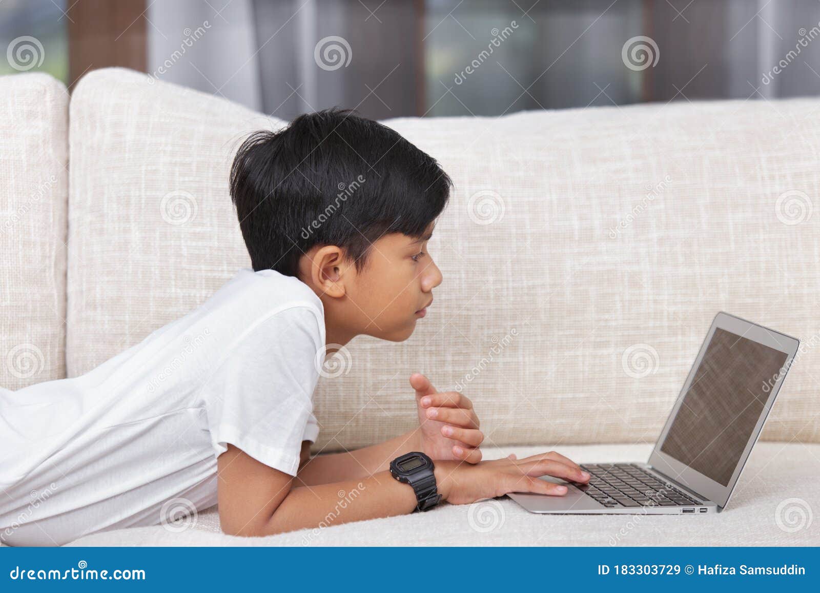 Boy is Lying Down while Using Laptop Stock Image - Image of screen ...