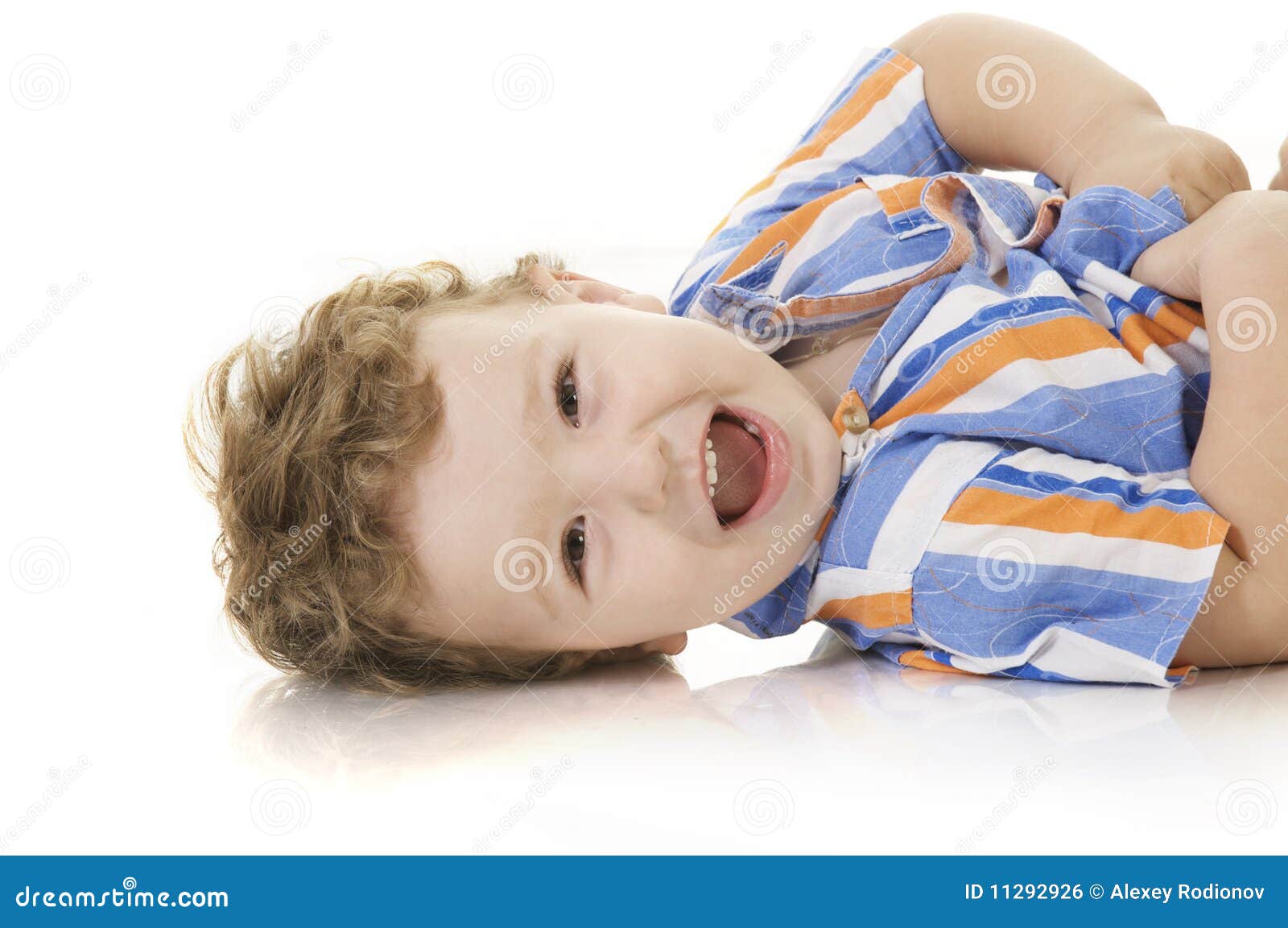 Boy lying on the floor stock photo. Image of happy, beautiful - 11292926