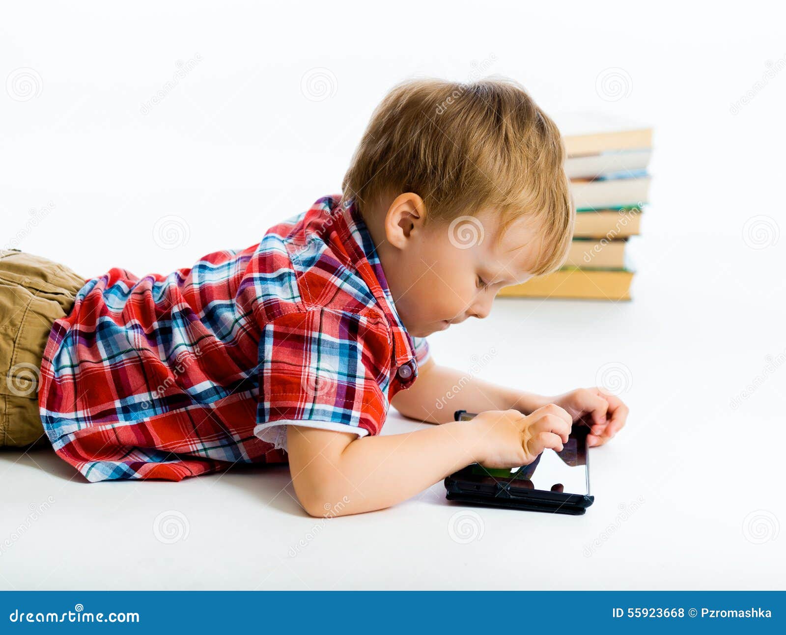 Boy Lying on the Floor with Tablet Computer Stock Photo - Image of ...