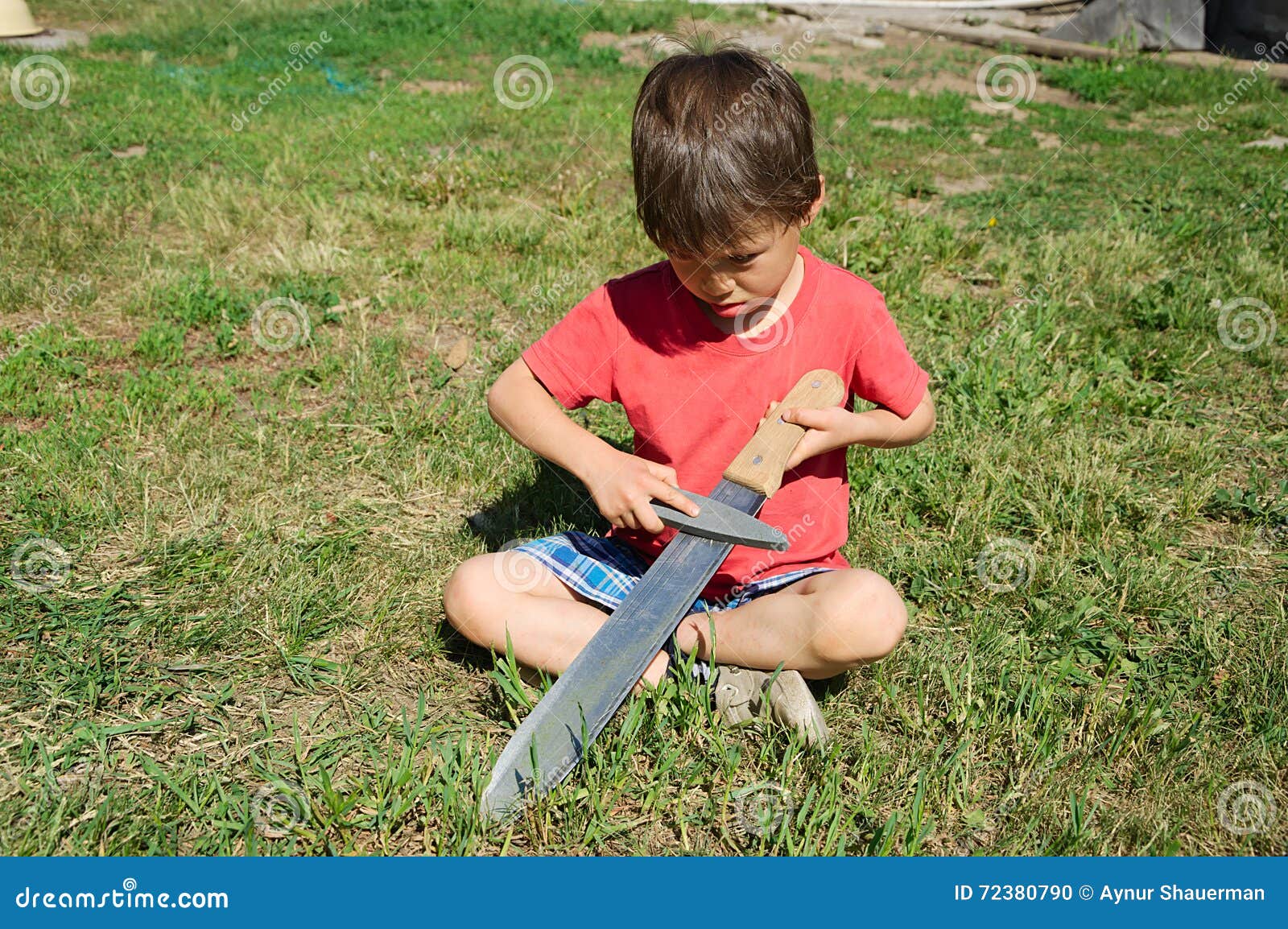 Boy Machete Edge Sharpening Stock Photos - Free & Royalty-Free Stock ...