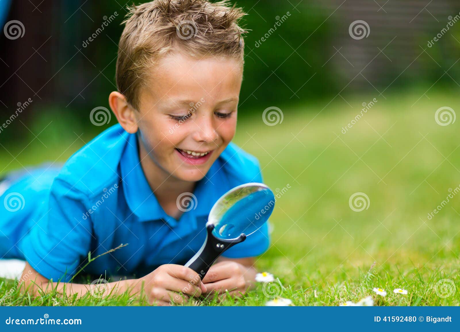 Boy with magnifier stock photo. Image of kids, young - 41592480