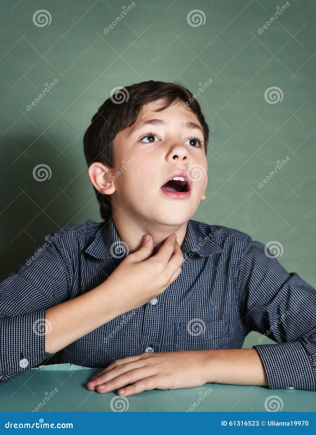 Boy Make Singing Exercises In Blue Background Royalty-Free Stock Photo ...