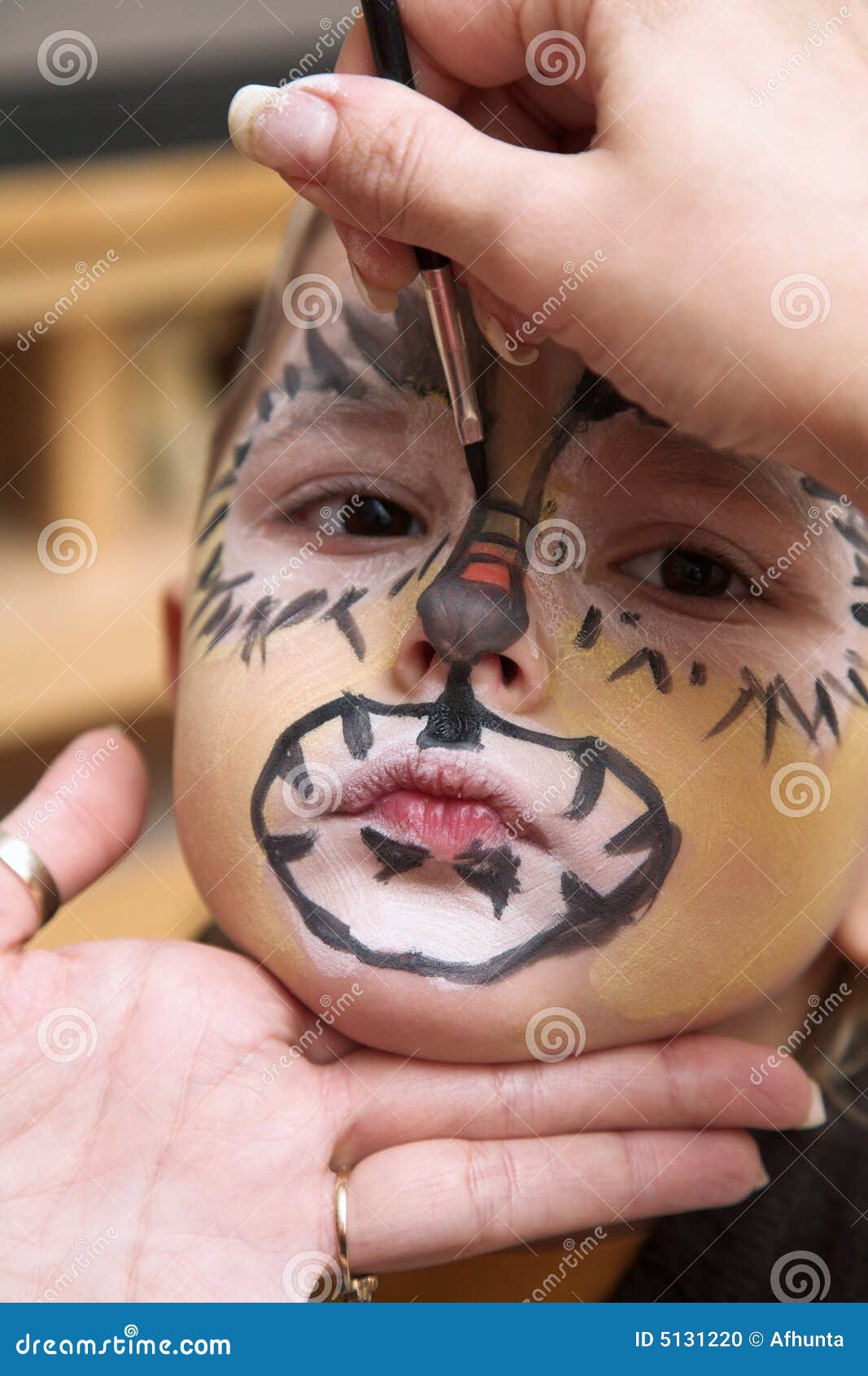 The boy and a make-up stock photo. Image of mouth, close - 5131220
