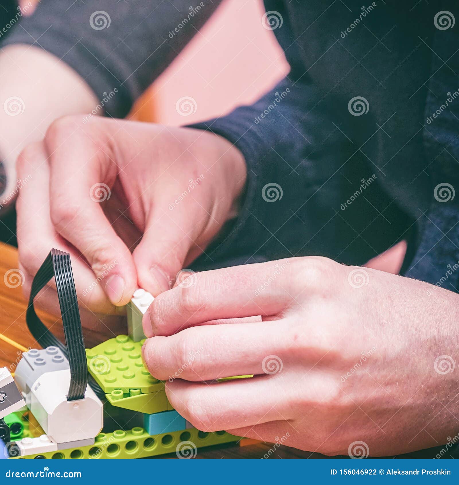 The Boy Makes a Car Model from the Details of Children`s Designer Stock ...