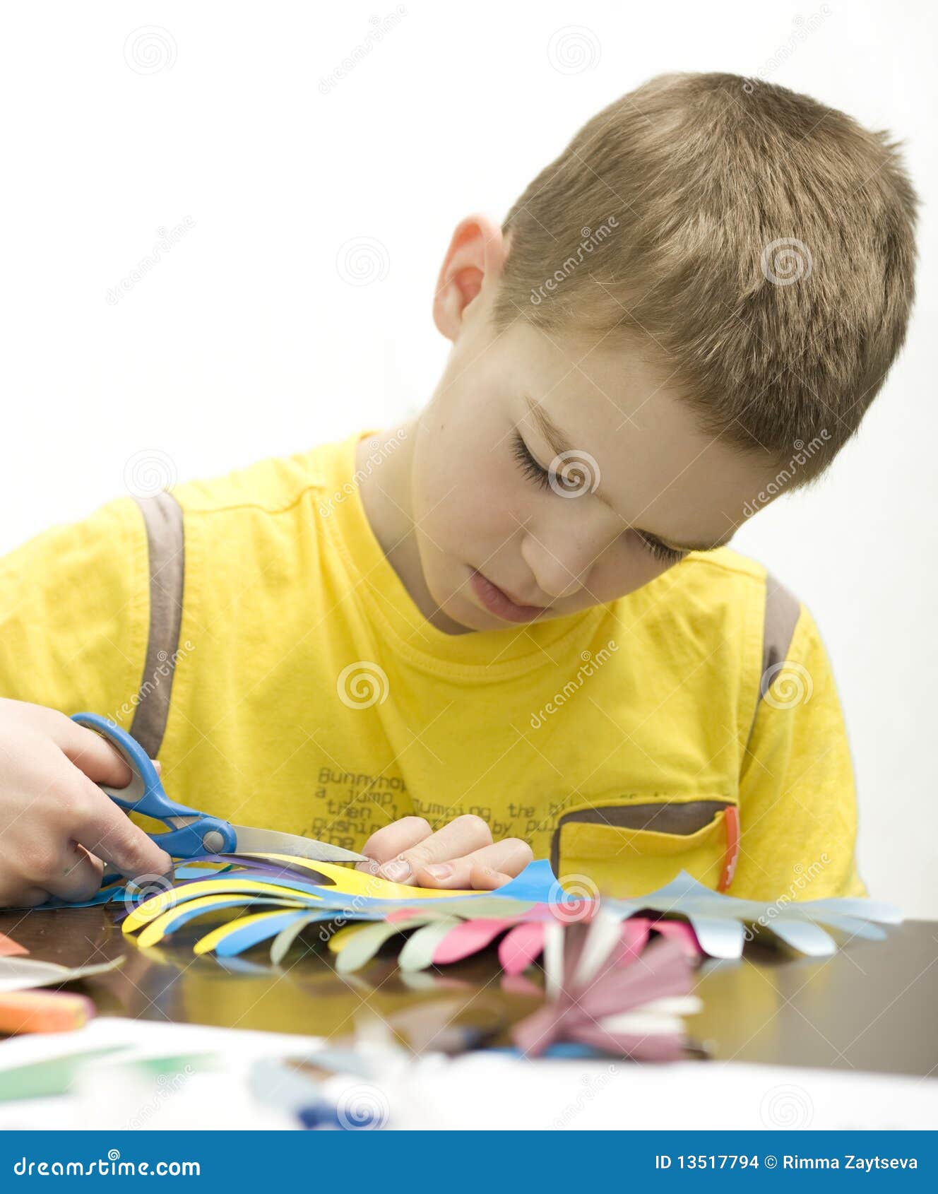 The boy makes crafts. stock photo. Image of paper, think - 13517794