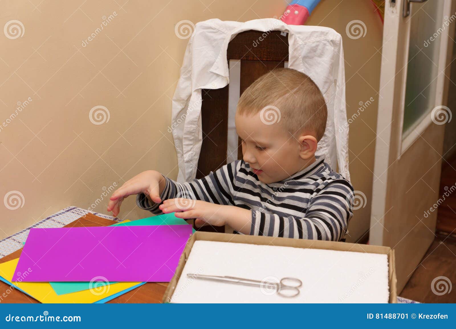 Boy makes crafts stock image. Image of paper, child, coloring - 81488701