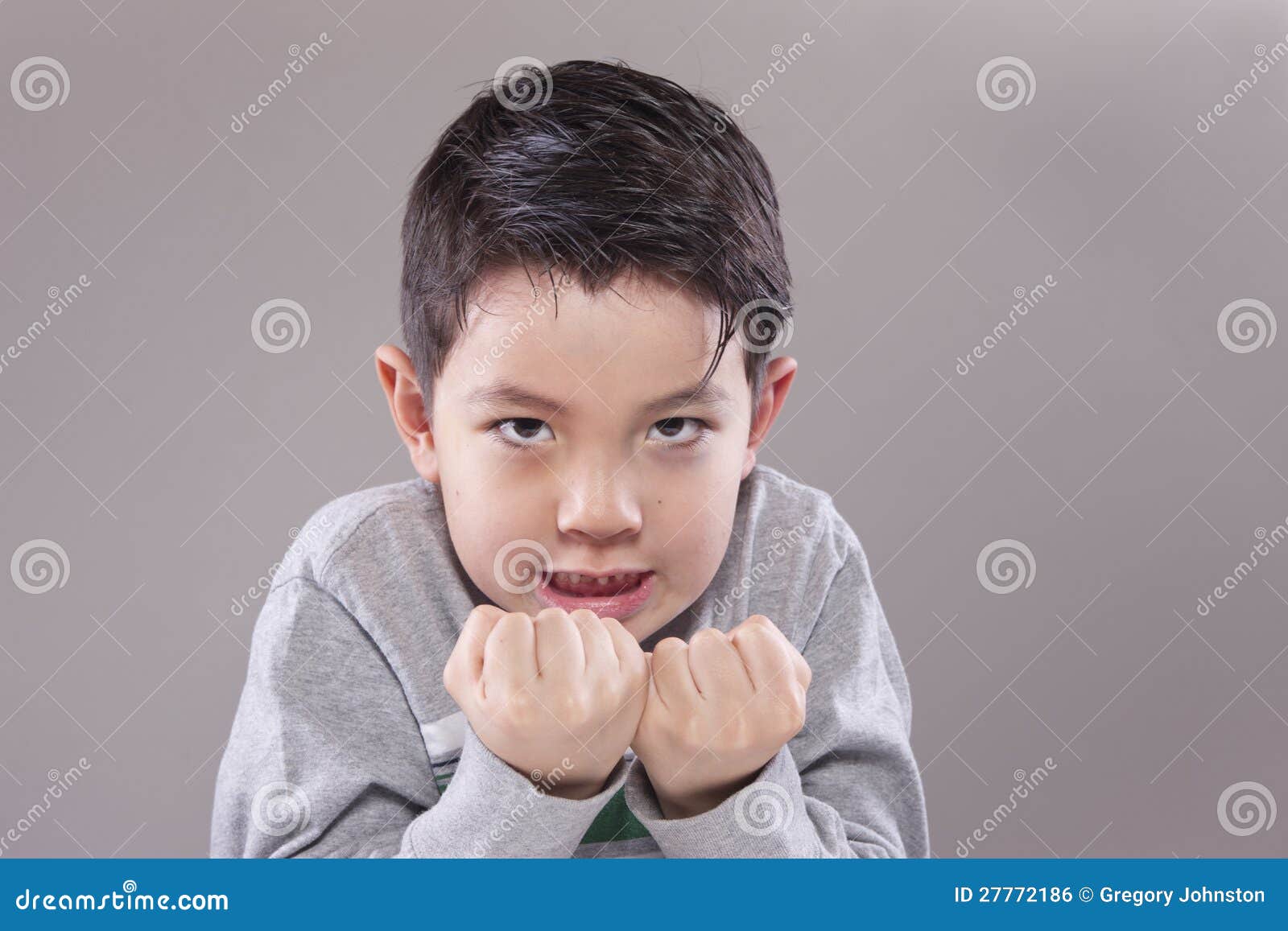 Boy makes fists. stock photo. Image of childhood, face - 27772186