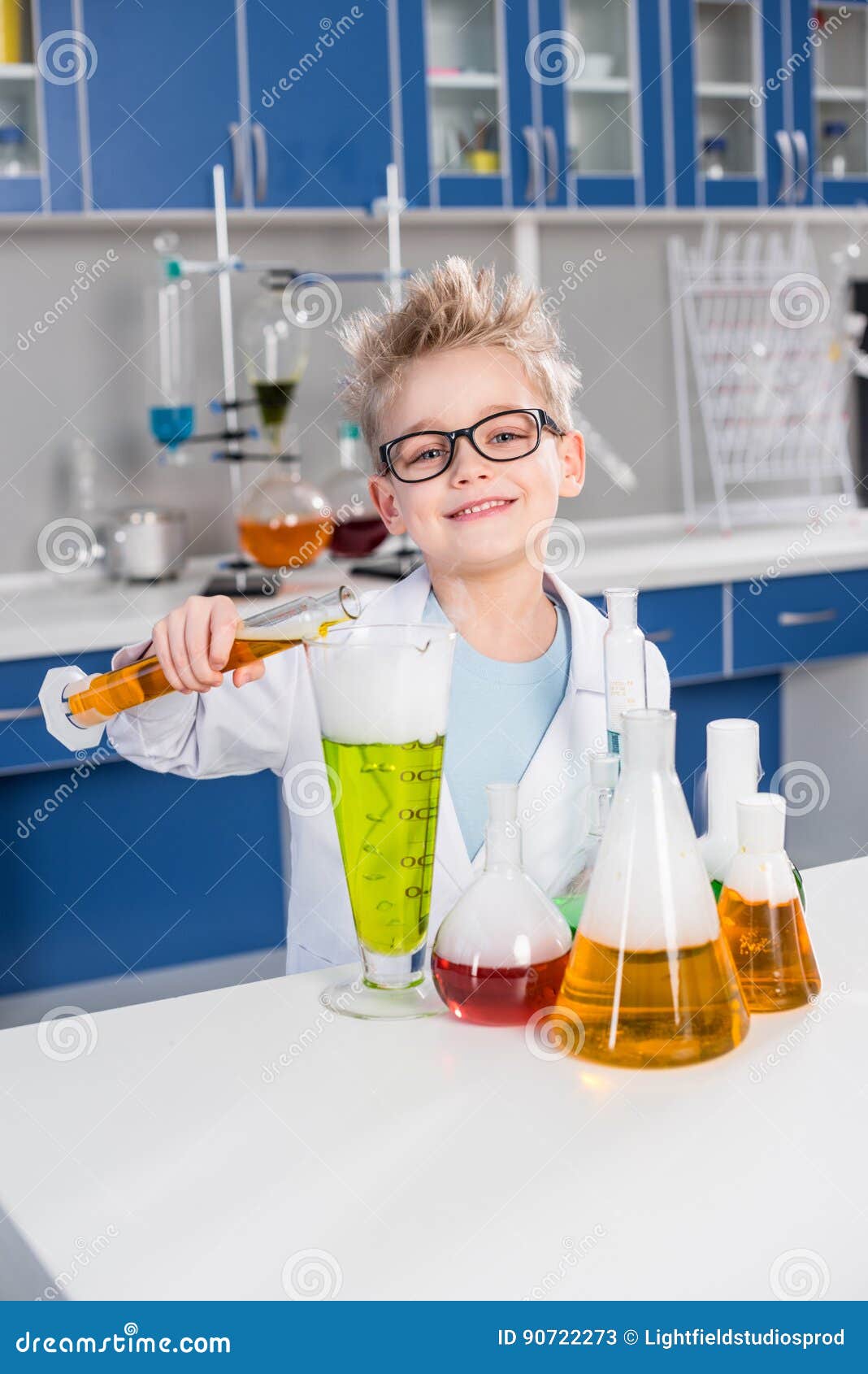 Boy making experiment stock image. Image of scientist - 90722273