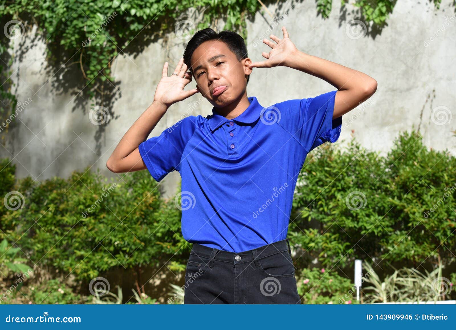 Boy Making Funny Faces stock photo. Image of feelings - 143909946