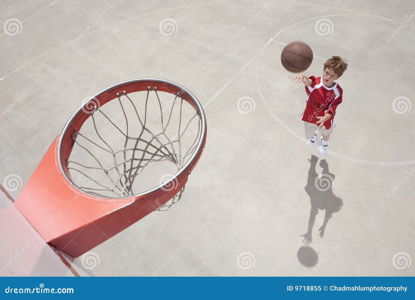 Boy making jump shot stock image. Image of jump, health - 9718855