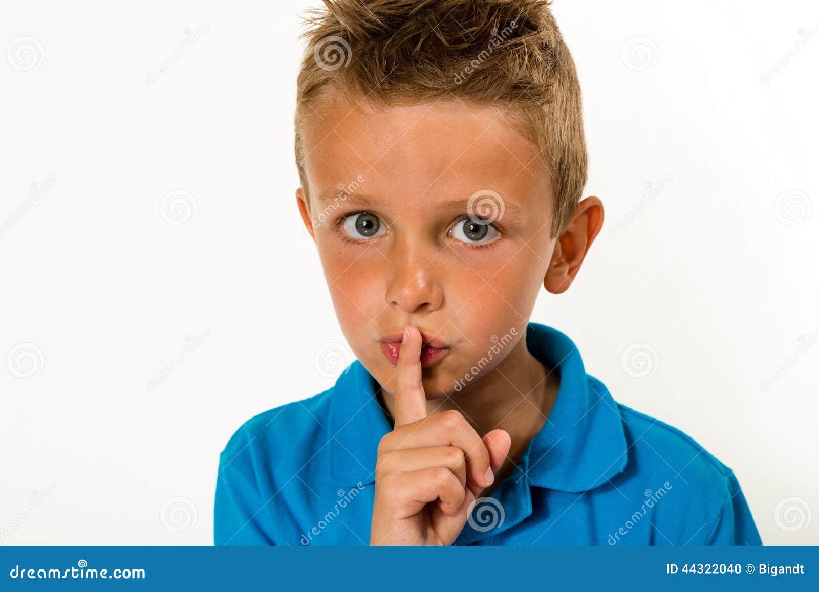 Boy Making Keep Quiet Gesture Stock Photo - Image of kids, finger: 44322040
