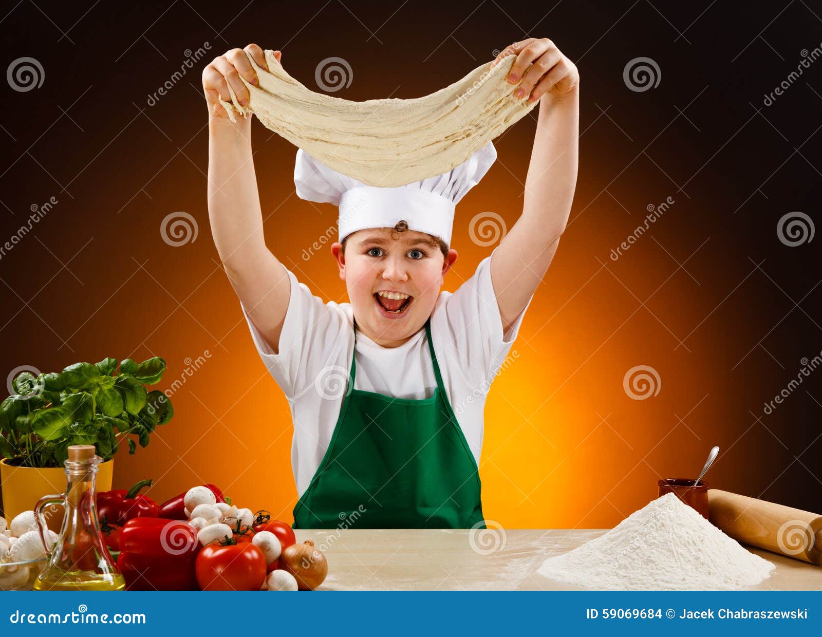 Boy making pizza dough stock photo. Image of mixing, male - 59069684