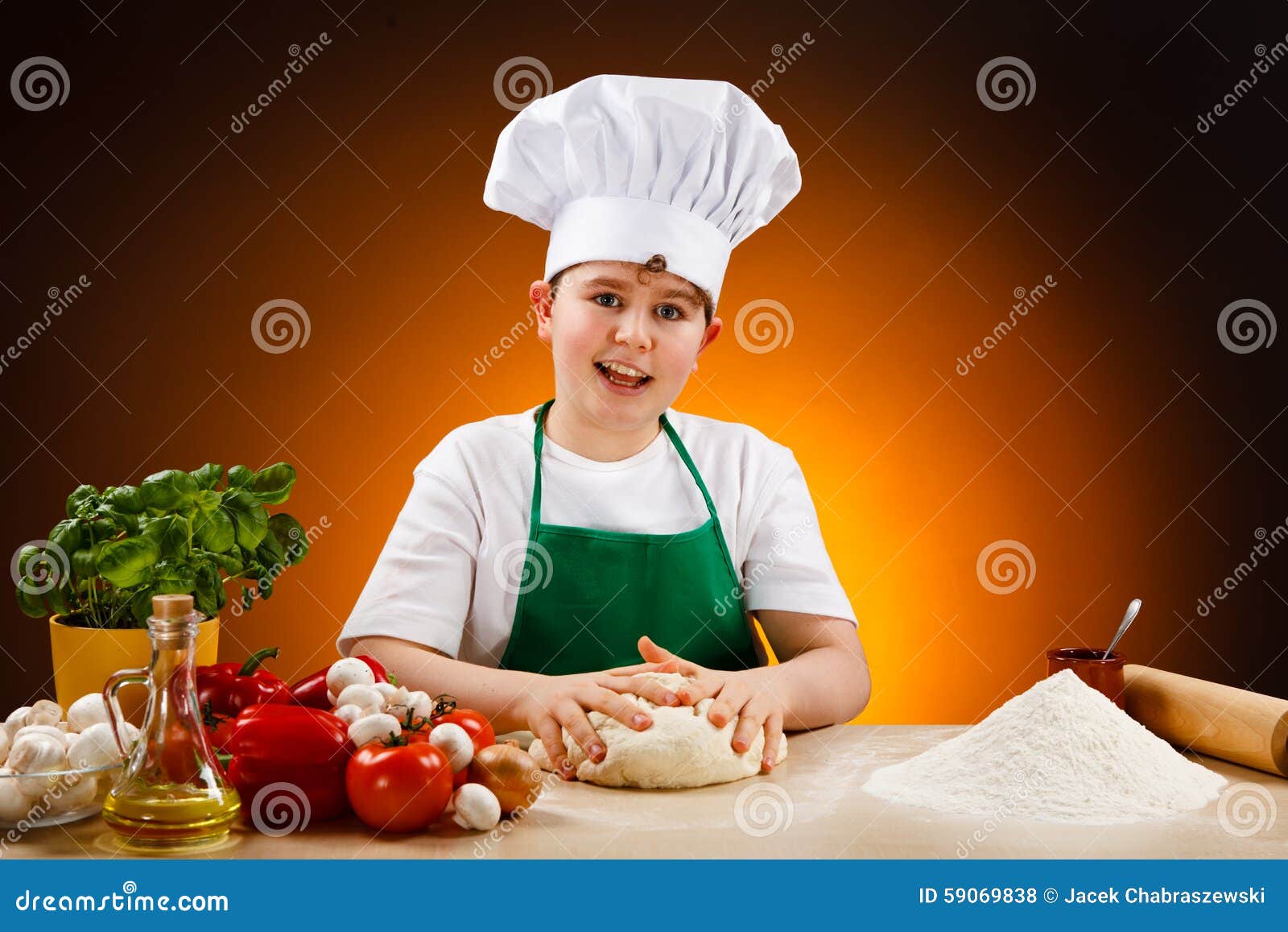 Boy making pizza dough stock photo. Image of garlic, child - 59069838
