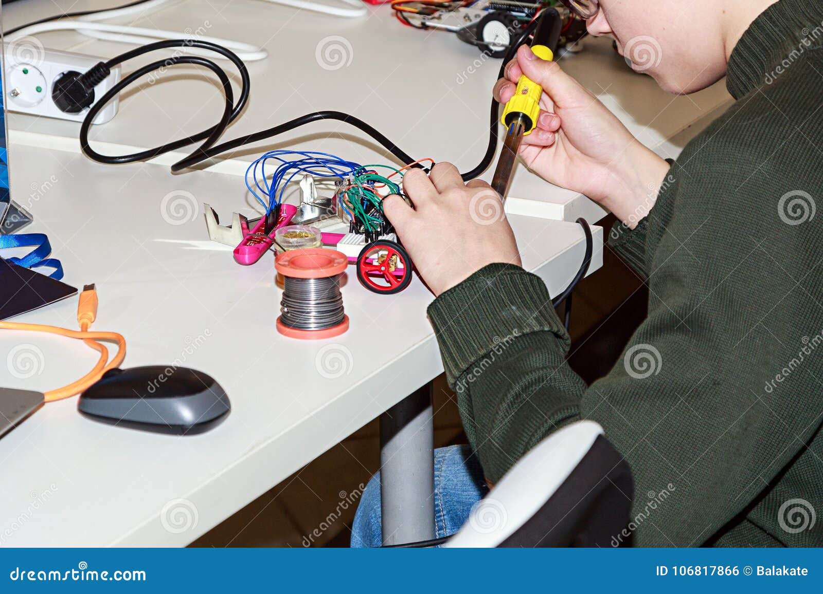 A Boy Making a Robot with the Electric Soldering Iron Editorial Photo ...