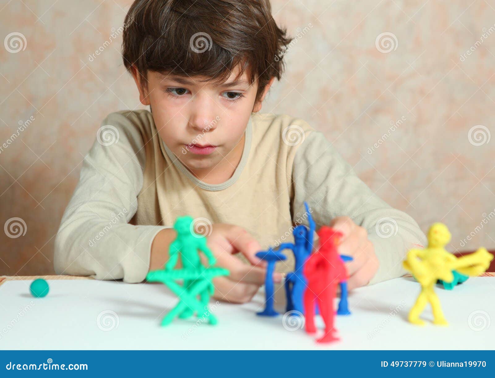 Boy Making Rock Group Musician from Modeling Clay Stock Image - Image ...
