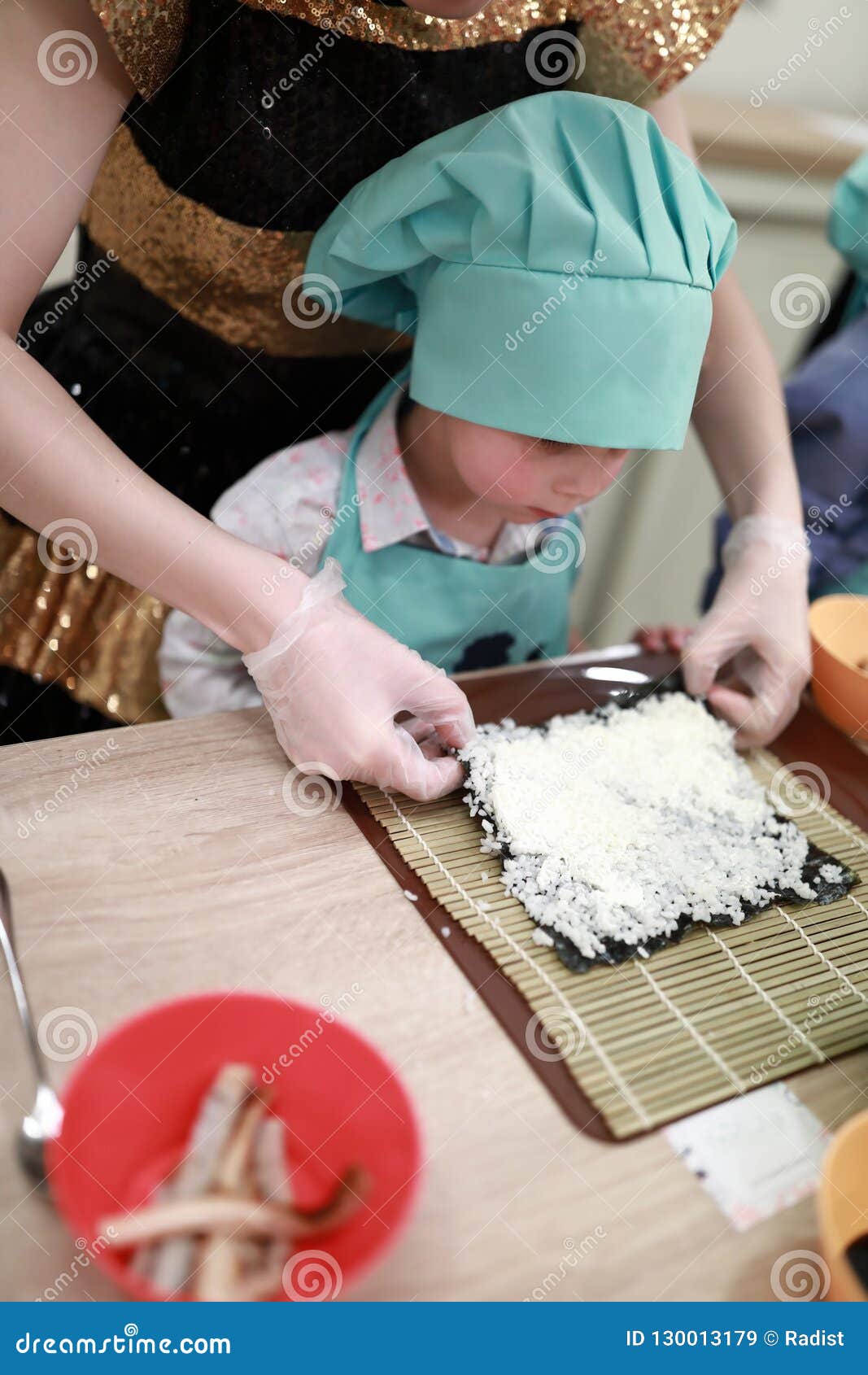 Boy making sushi stock image. Image of east, food, eating - 130013179