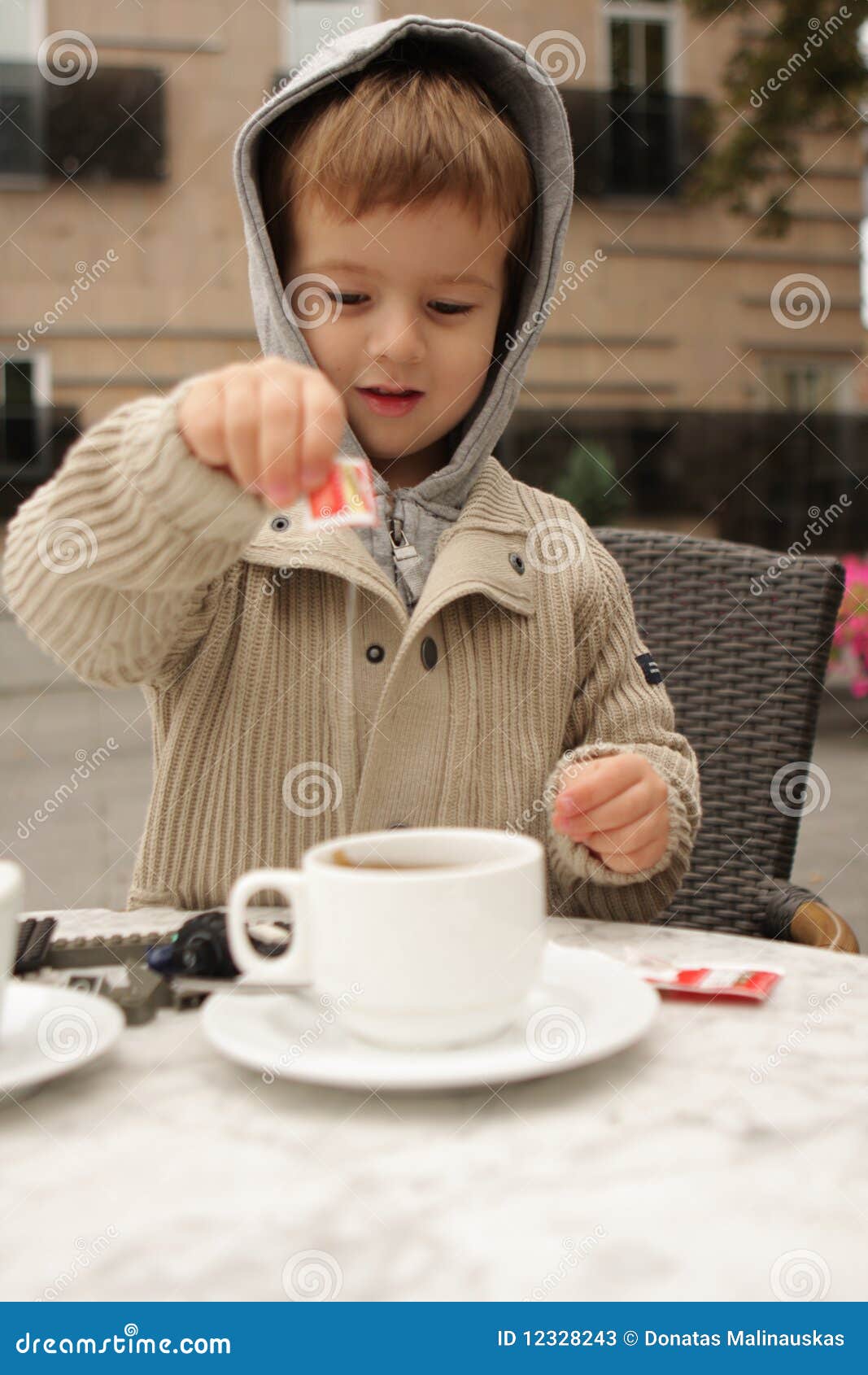 Boy making tea stock image. Image of attentive, outdoor - 12328243