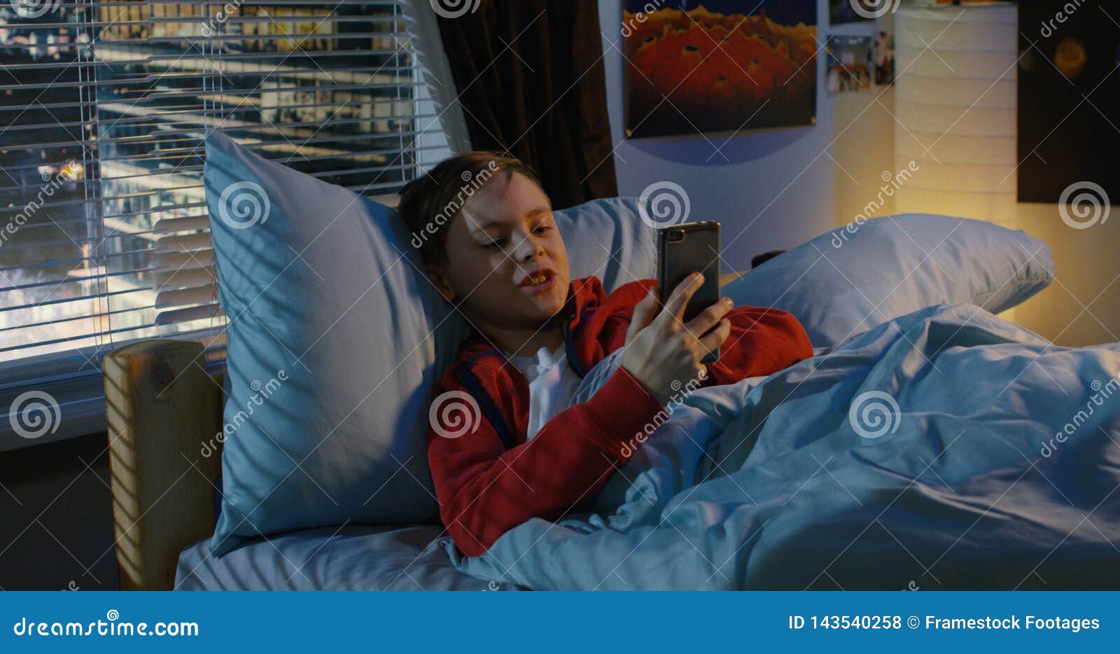 Boy Making a Video Call with His Smartphone Stock Photo - Image of ...