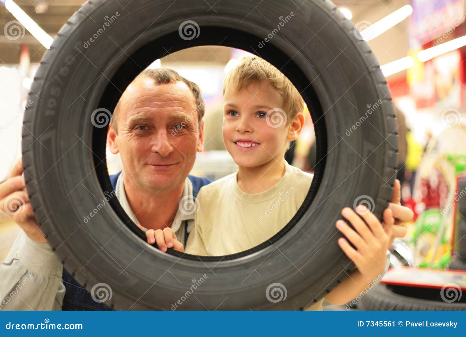 Boy and Man Look into Vehicle Tire Stock Image - Image of human ...