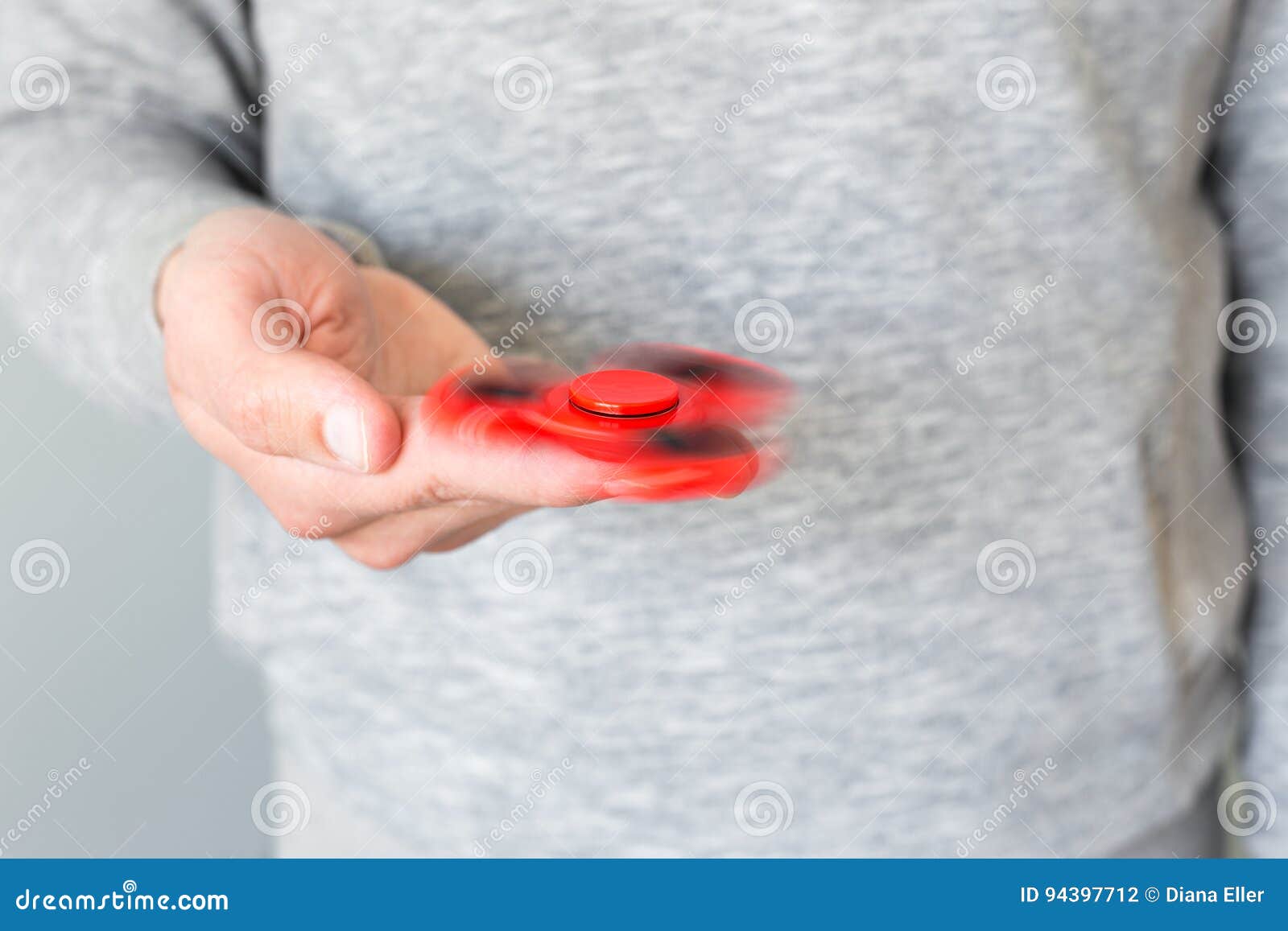 Boy or Man Rotating Fidget Spinner in Hands Stock Photo - Image of male ...