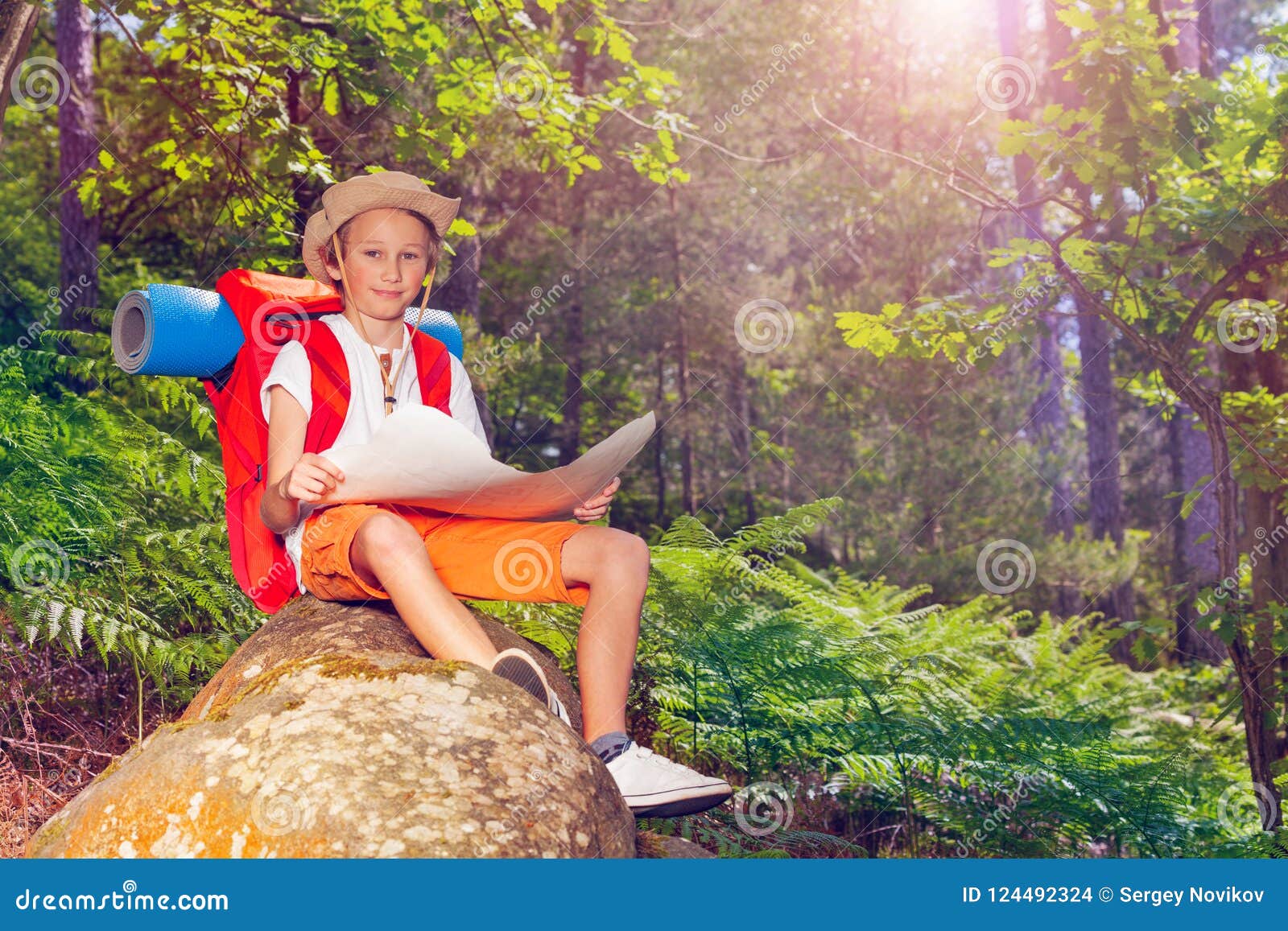 Boy with Map Sit on Stone during Hike Stock Photo - Image of forest ...