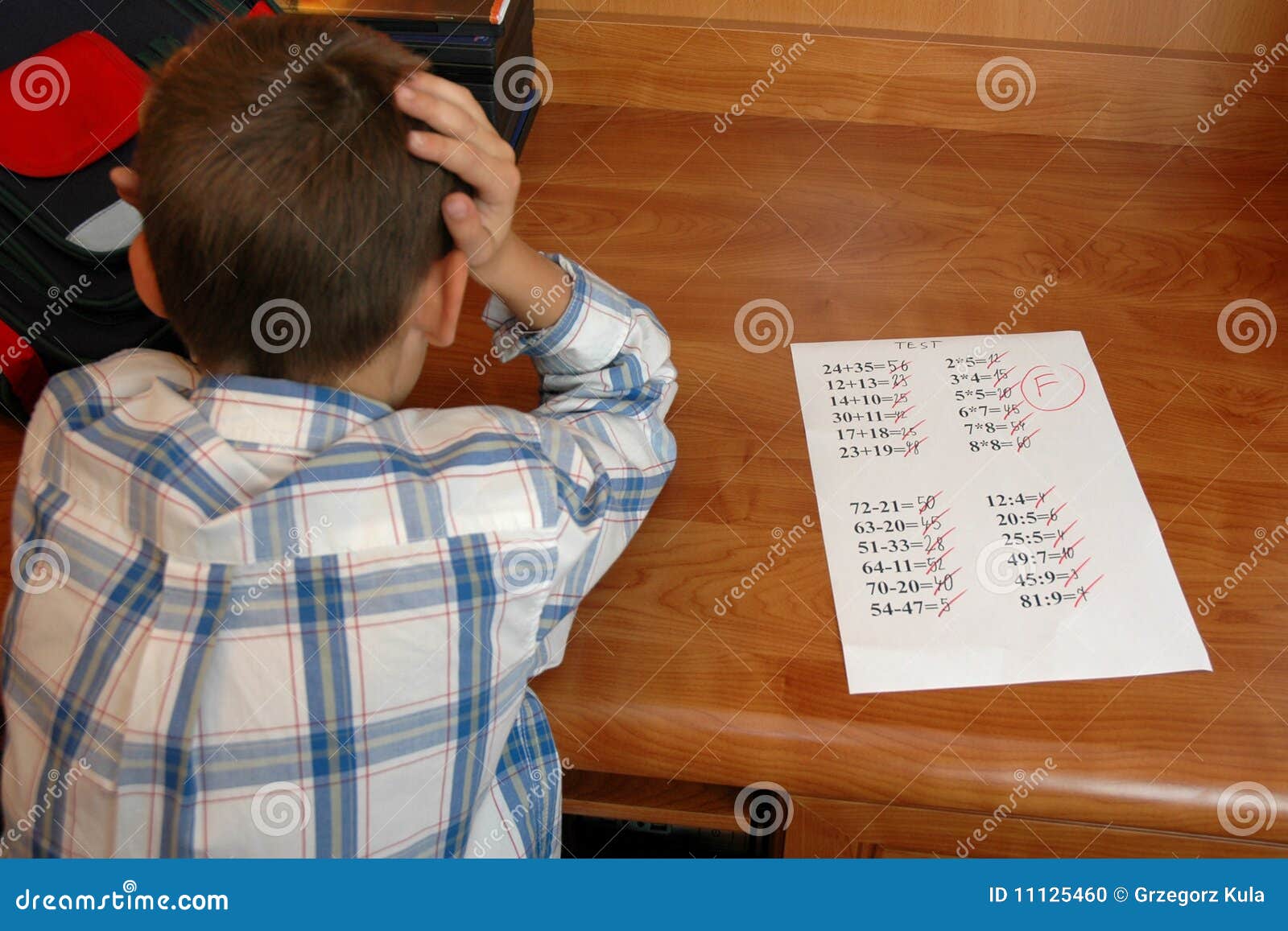 Boy with math test stock photo. Image of table, test - 11125460
