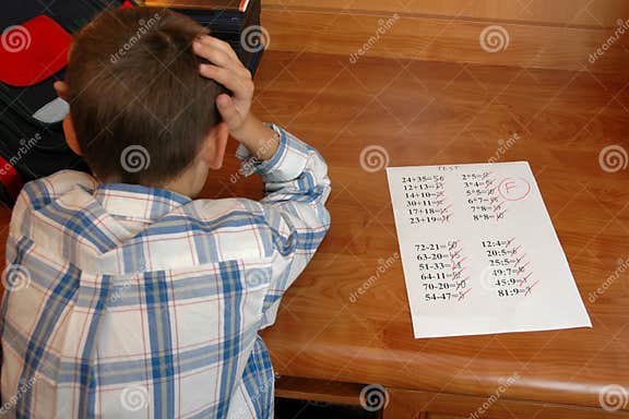 Boy with math test stock photo. Image of table, test - 11125460