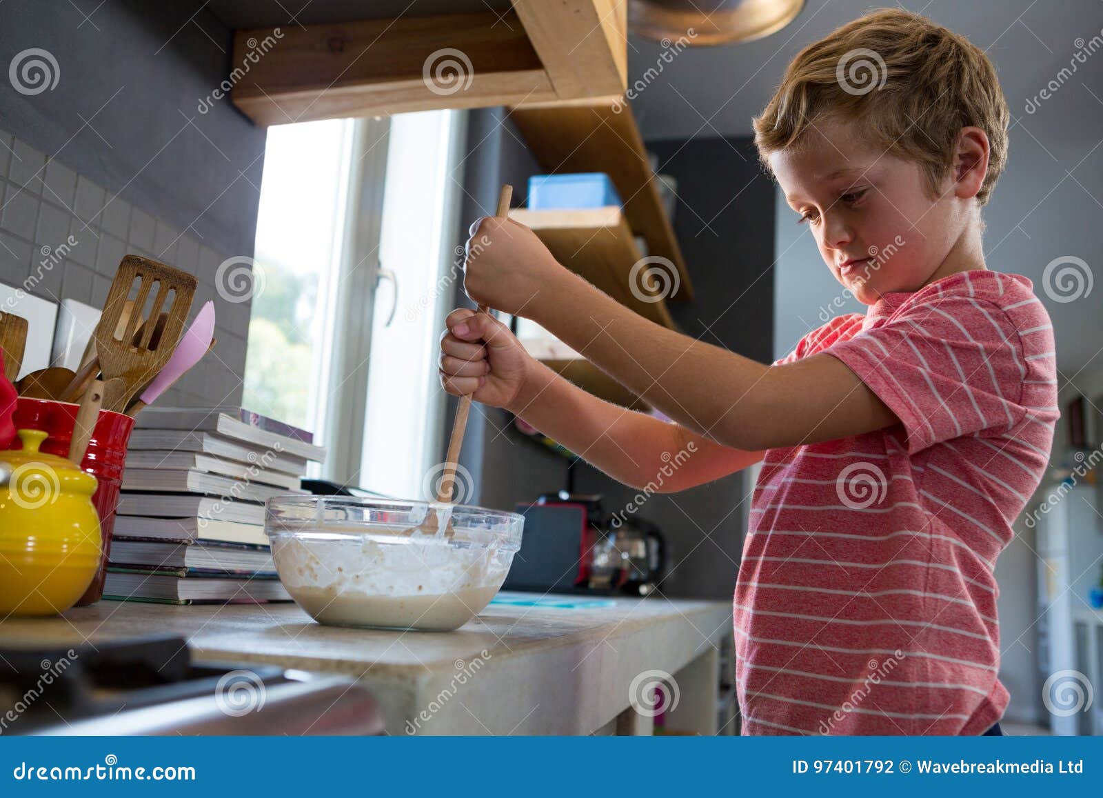 Boy Mixing Batter in Kitchen Stock Photo - Image of life, holding: 97401792