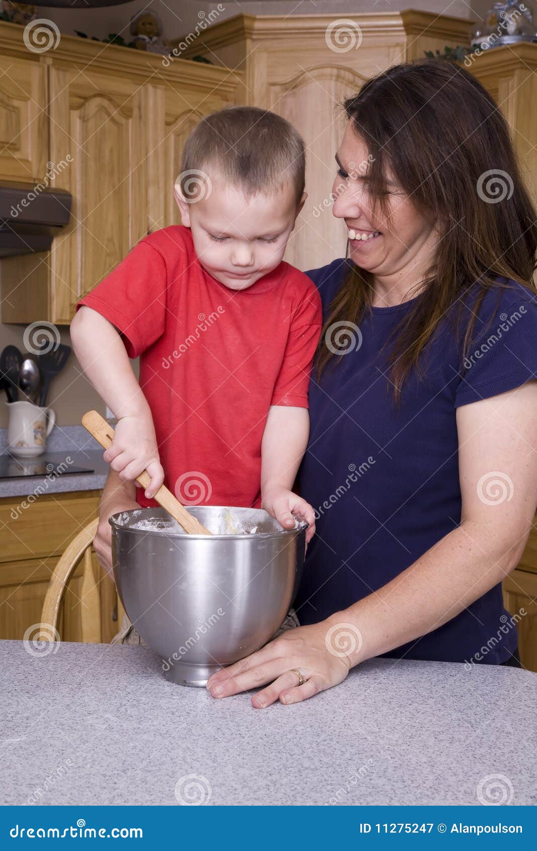Boy mixing with mother stock image. Image of cook, bowl - 11275247