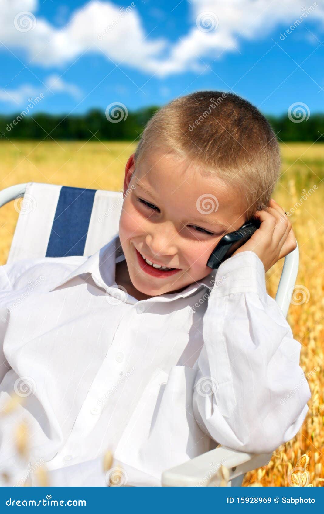 Boy with mobile phone stock image. Image of handsome - 15928969