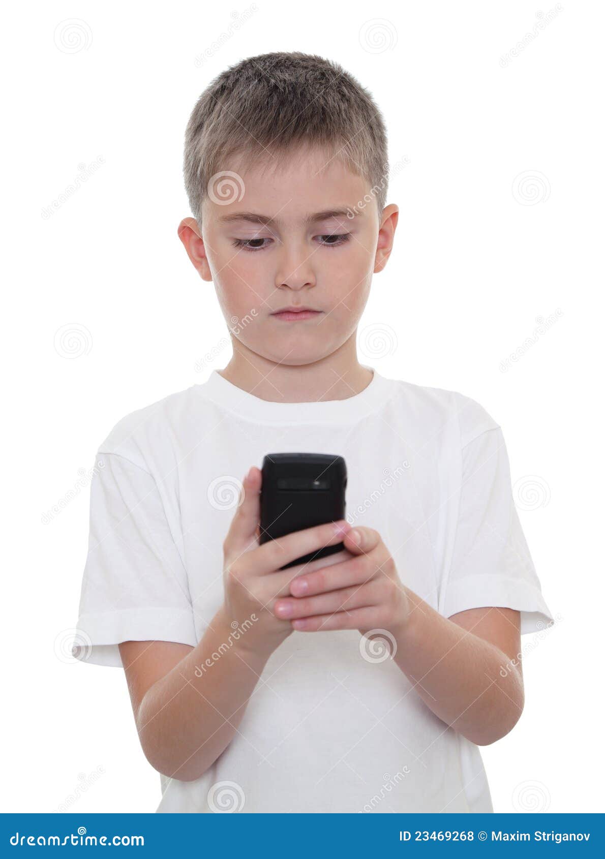 A boy with a mobile phone stock photo. Image of games - 23469268