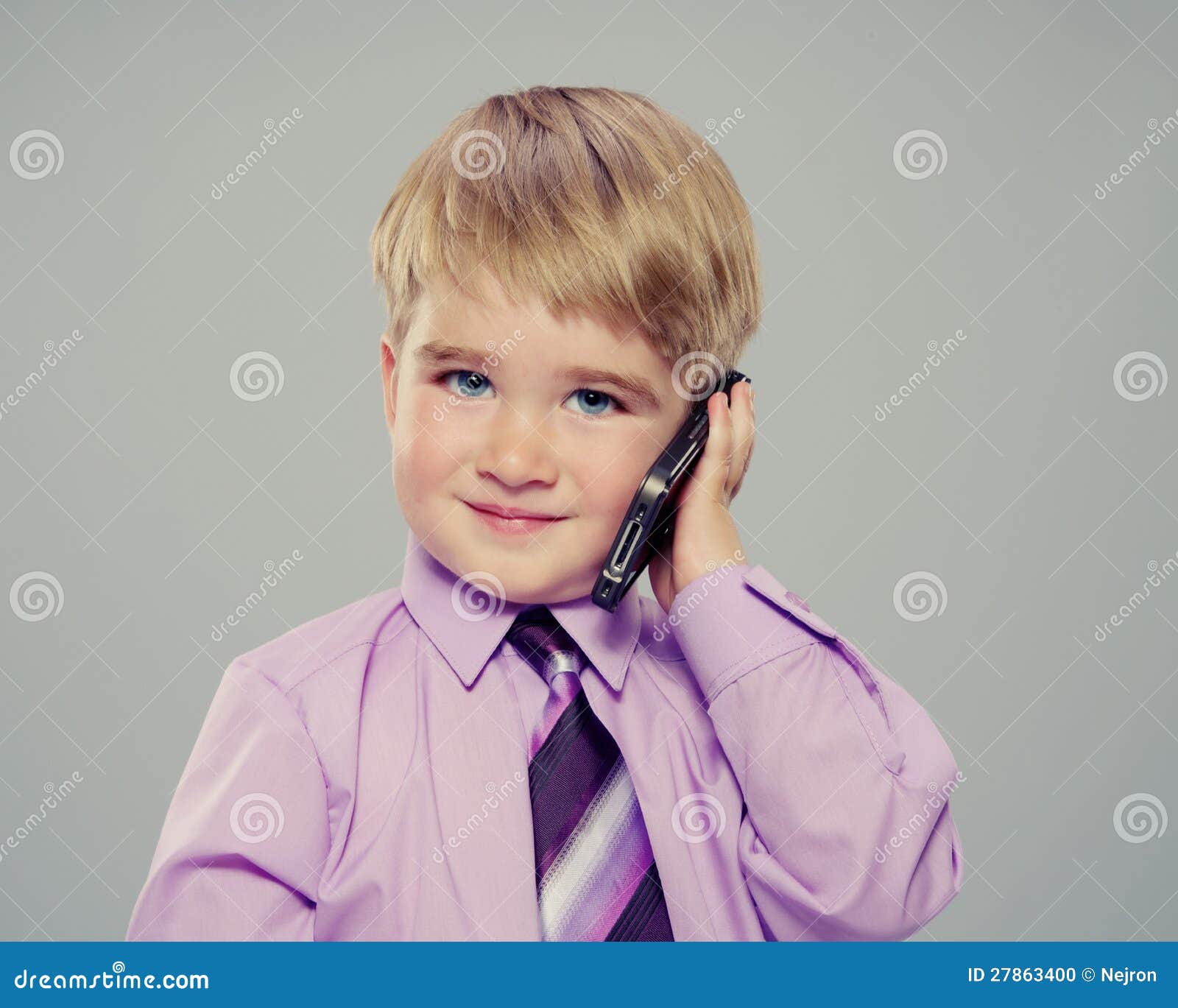 Boy with mobile phone stock photo. Image of adorable - 27863400