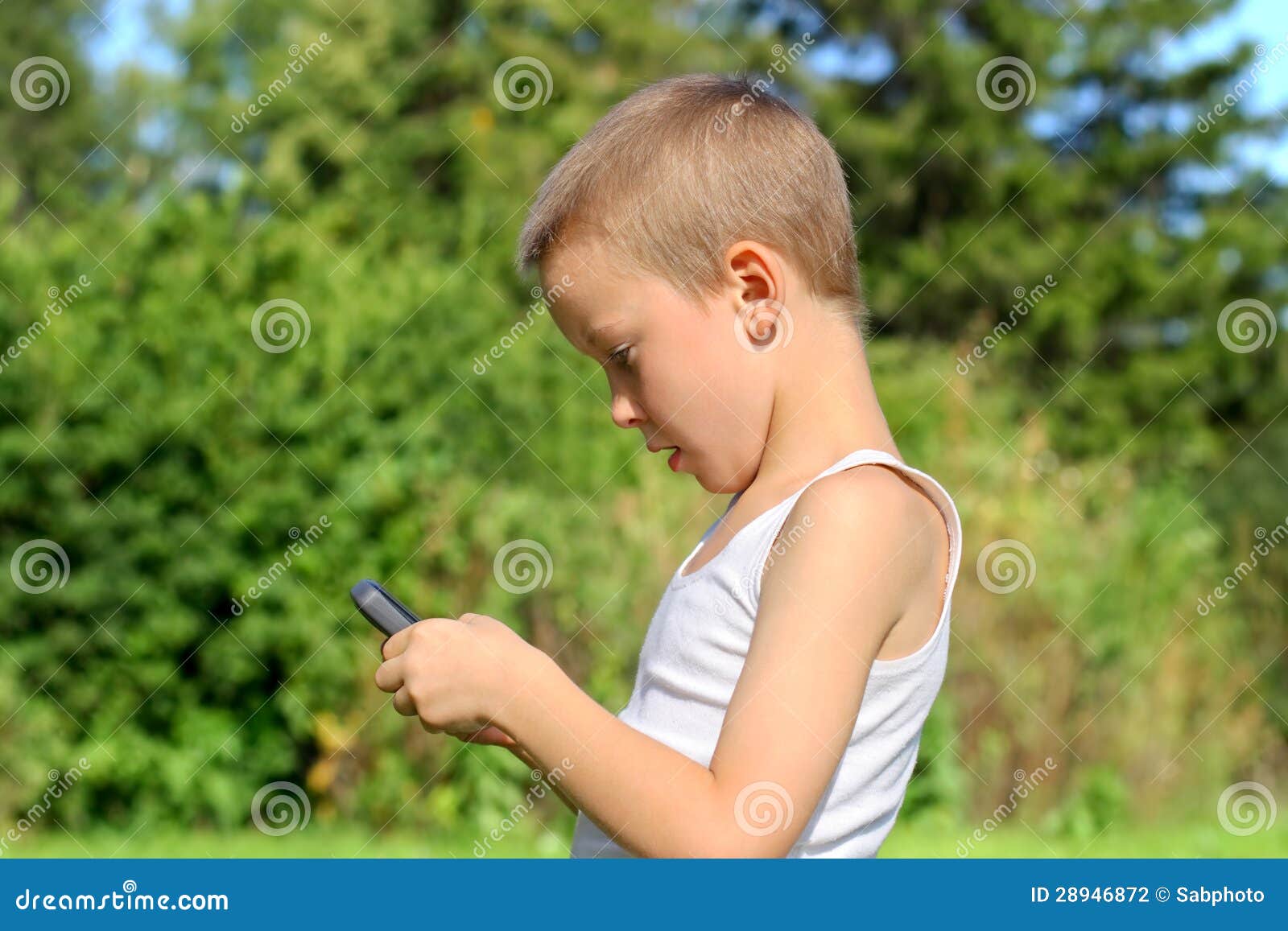 Boy with Mobile Phone stock photo. Image of concern, hold - 28946872