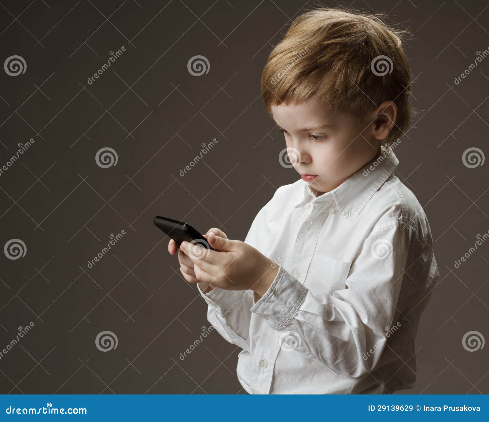 Boy with mobile phone stock image. Image of calling, mobile - 29139629
