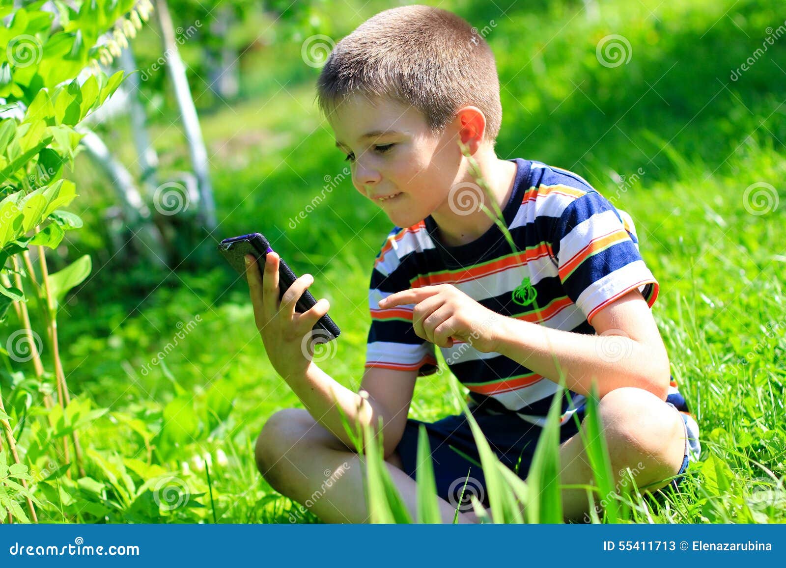 Boy with mobile phone stock image. Image of infant, phone - 55411713