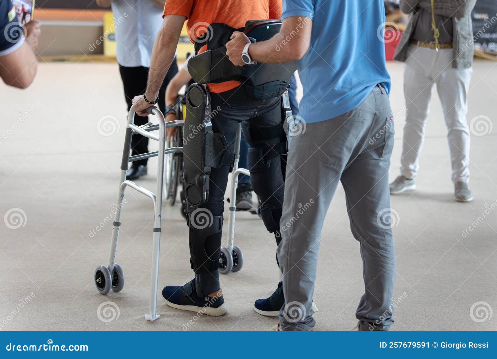 Boy with Mobility Problems in Lower Limbs in Upright Posture Walking ...