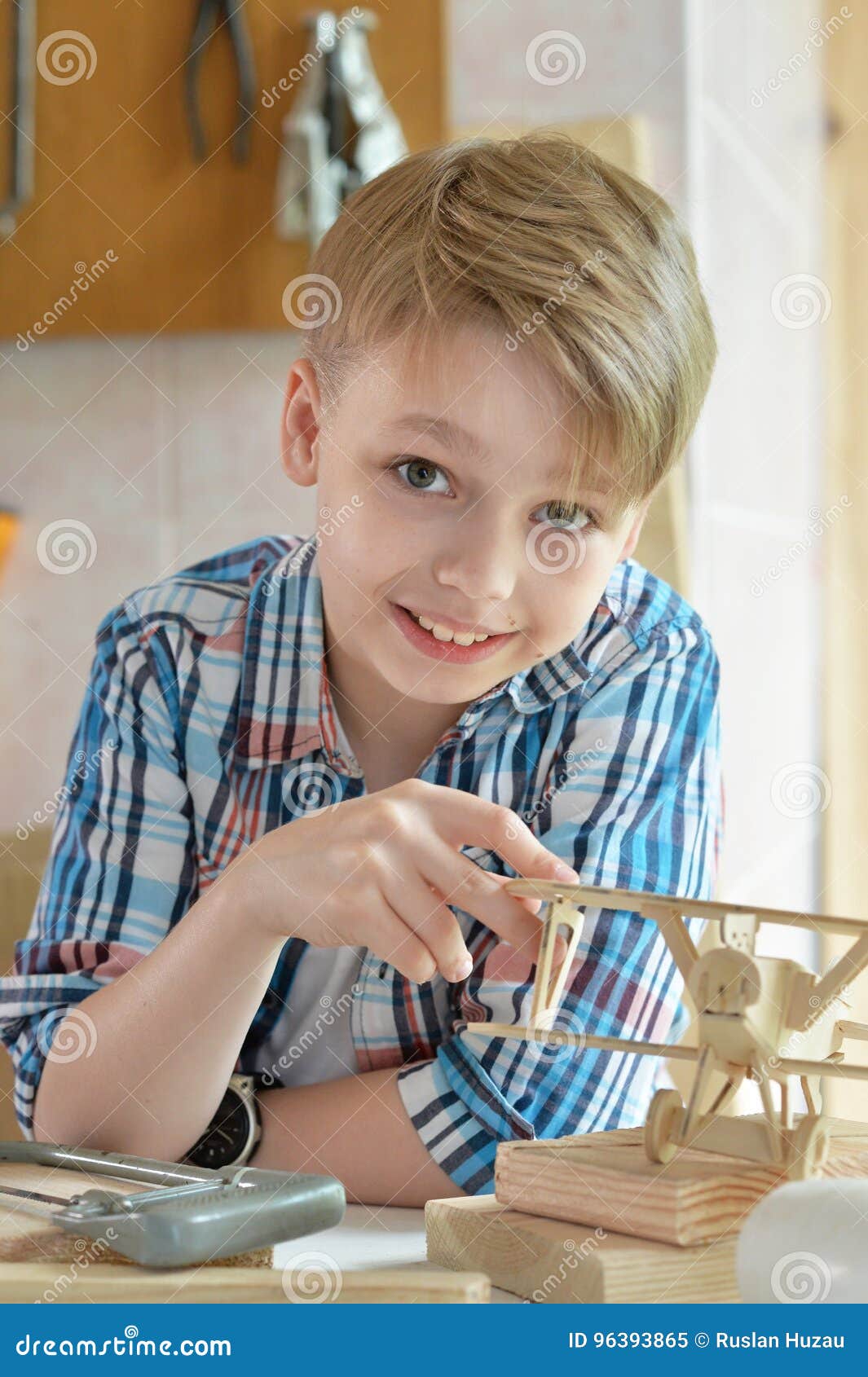 Boy with Model of Ship and Handsaw Stock Image - Image of education ...