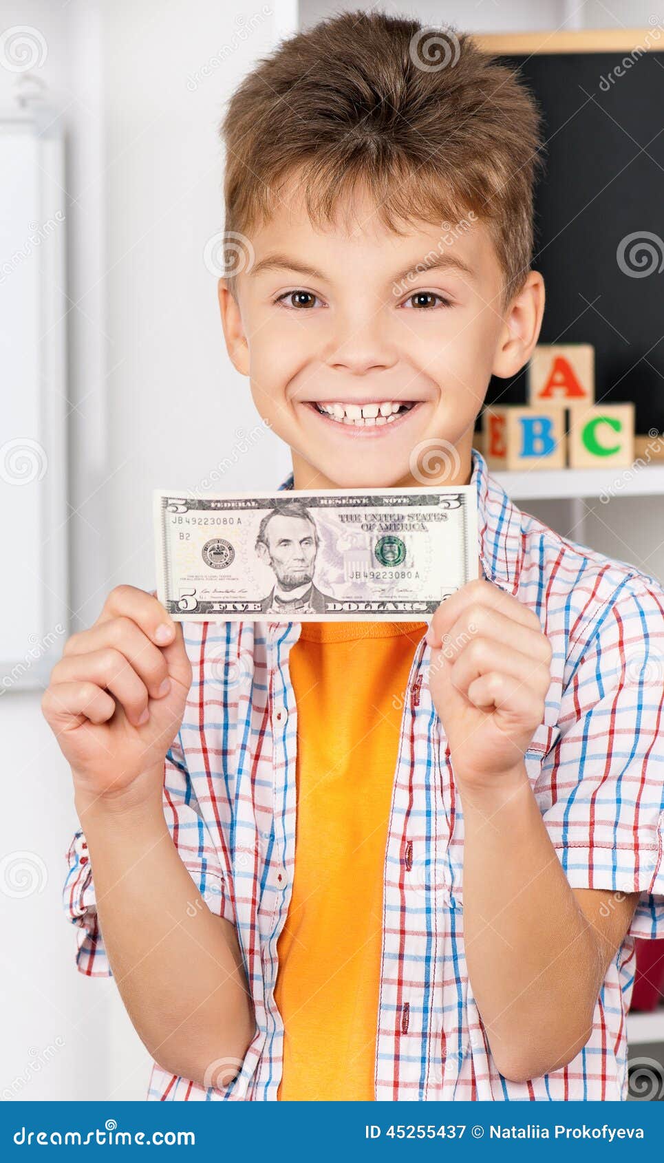 Boy with money stock image. Image of expression, back - 45255437