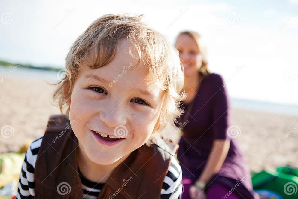 Boy and Mother and the Beach. Stock Photo - Image of caucasian, smiling ...