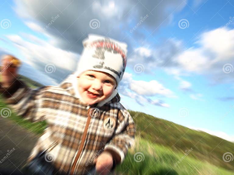 Boy in motion stock image. Image of drive, happy, adorable - 9139949