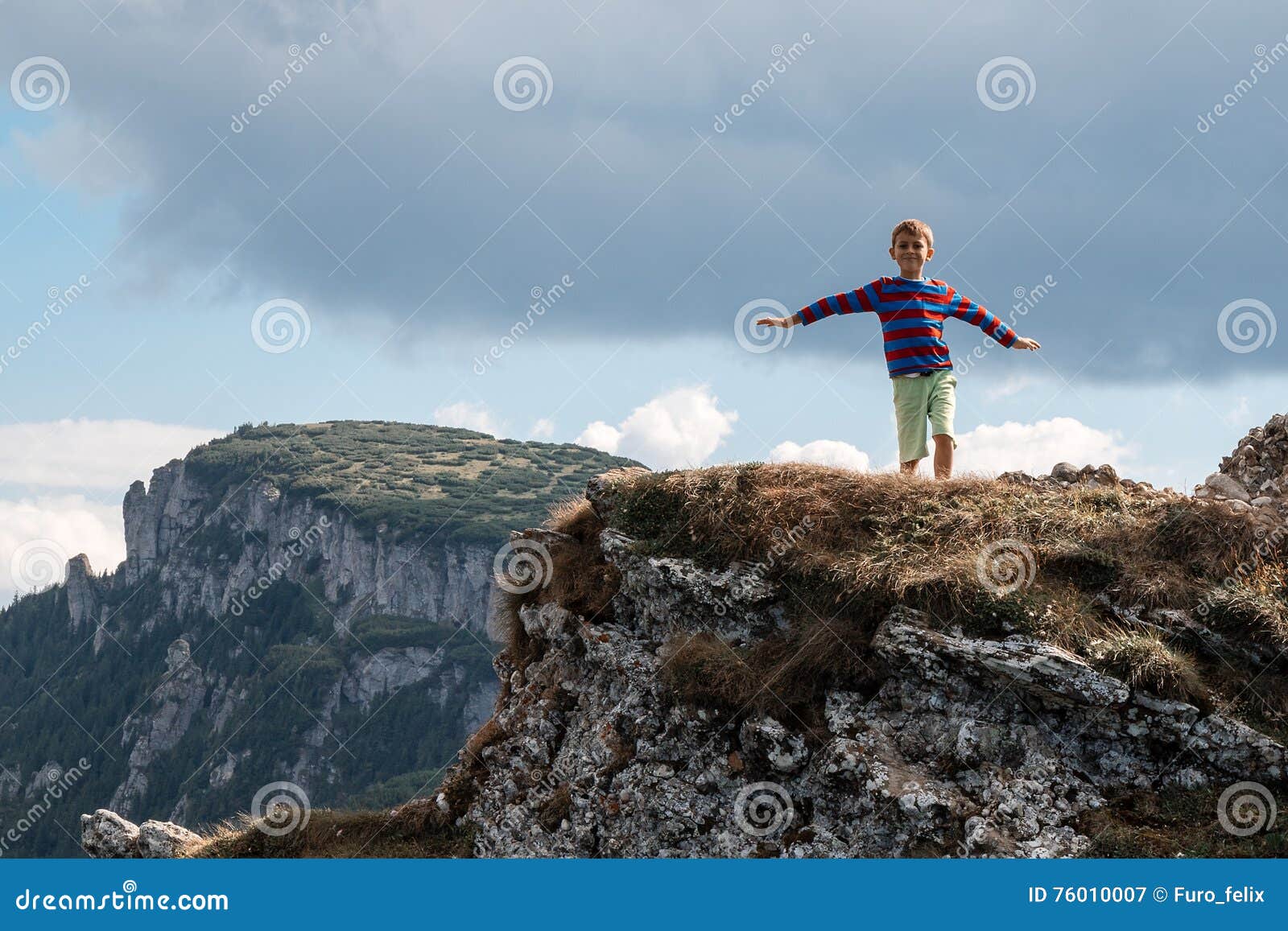 Boy on mountain stock image. Image of freedom, child - 76010007