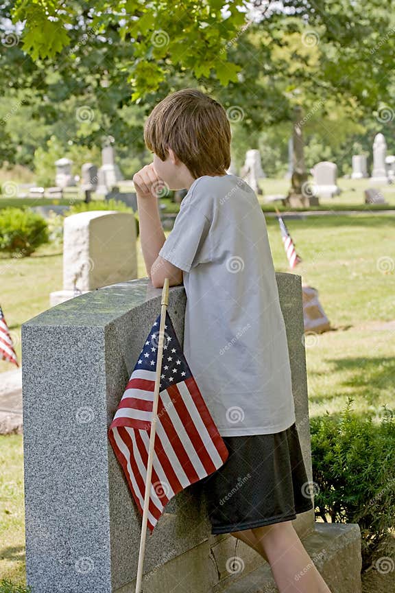 Boy Mourning at Gravesite stock photo. Image of kids, teenager - 5949882