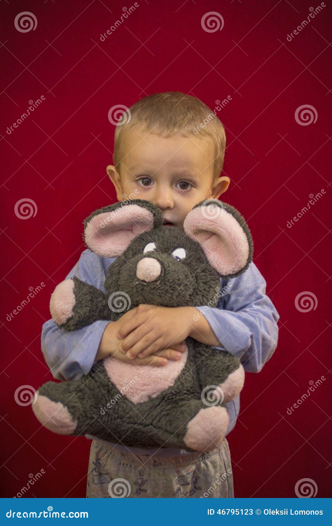 Boy with the mouse stock image. Image of posing, pleased - 46795123