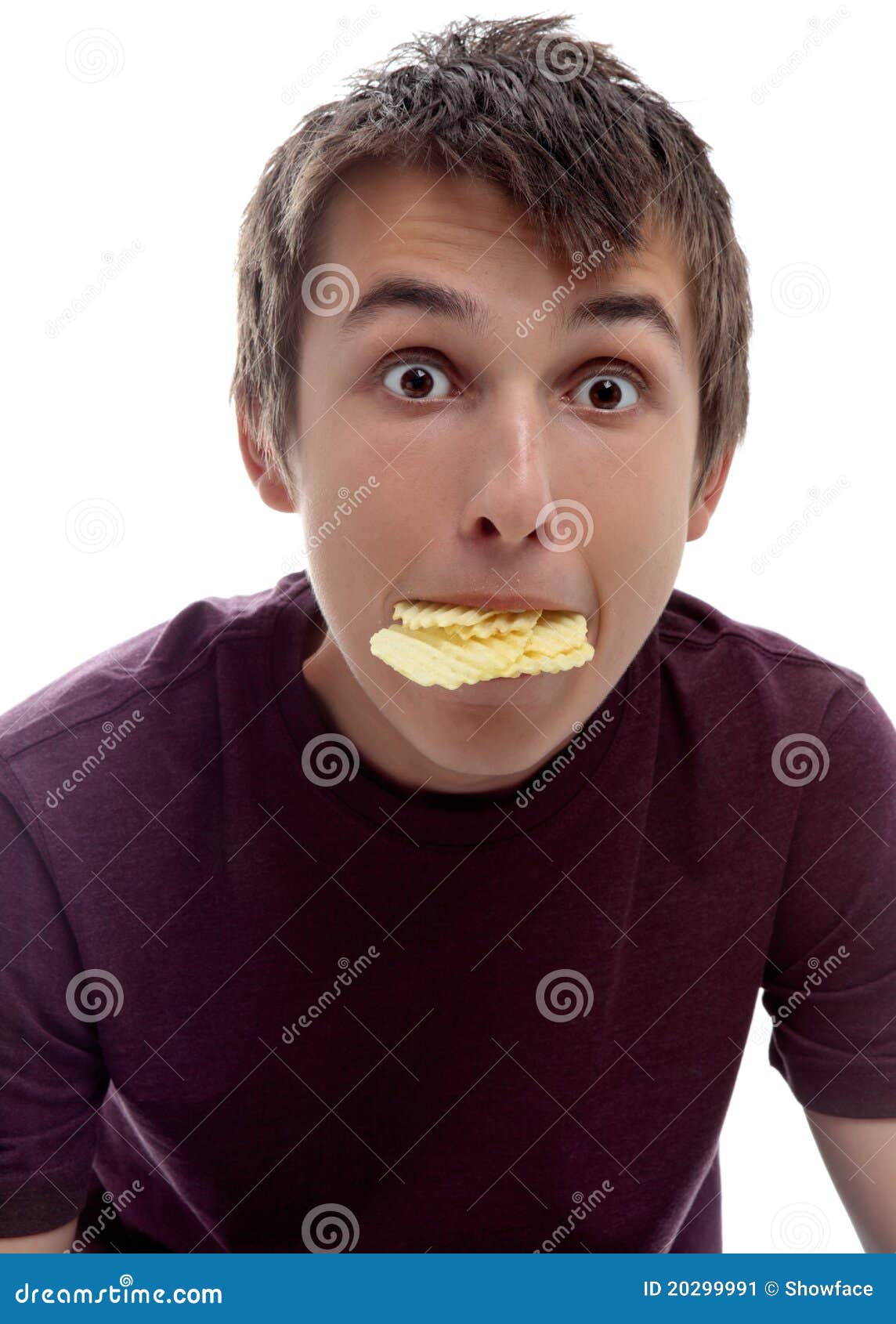 Boy mouthful potato chips stock image. Image of salty - 20299991