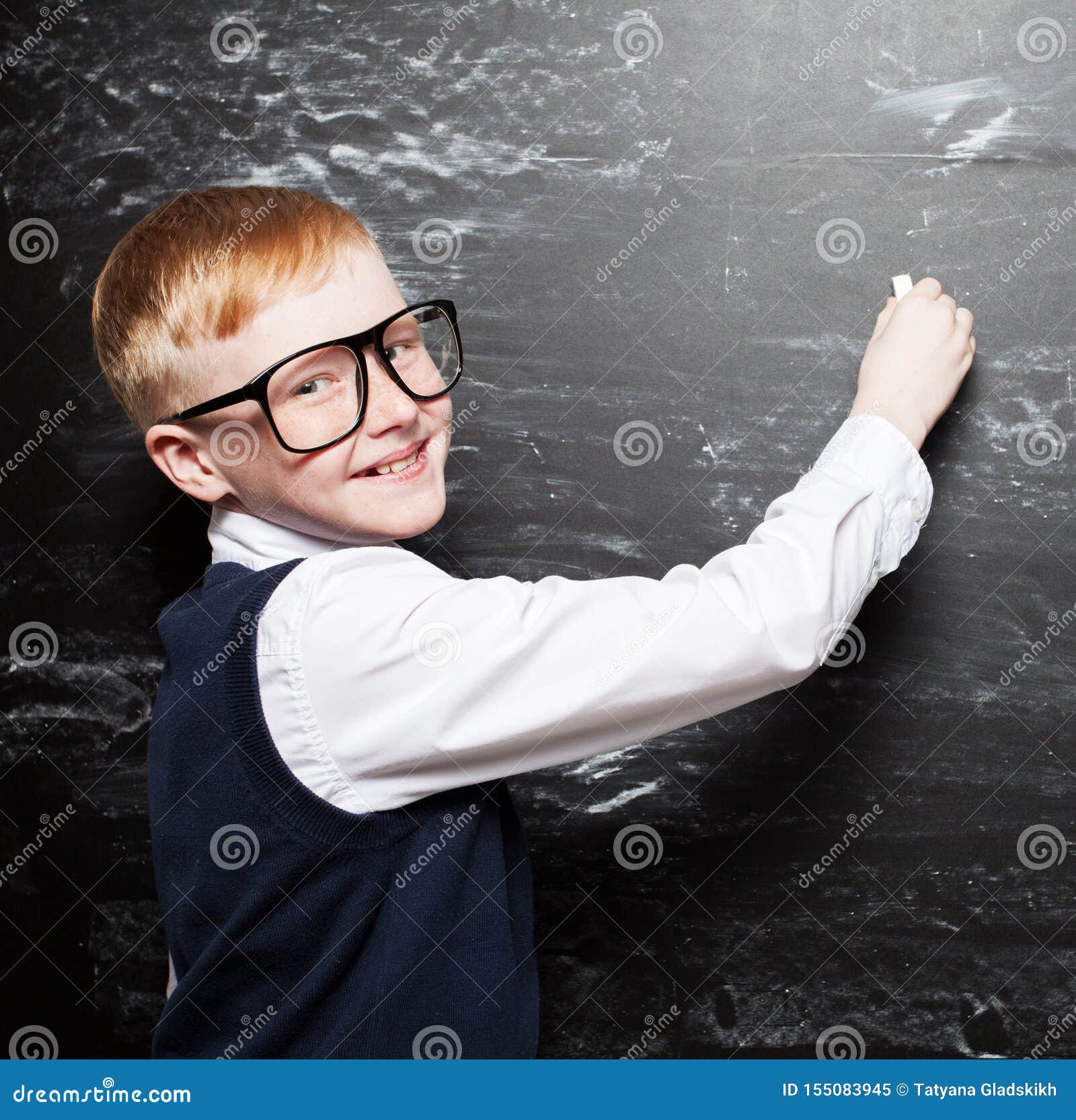Boy near blackboard stock image. Image of caucasian - 155083945