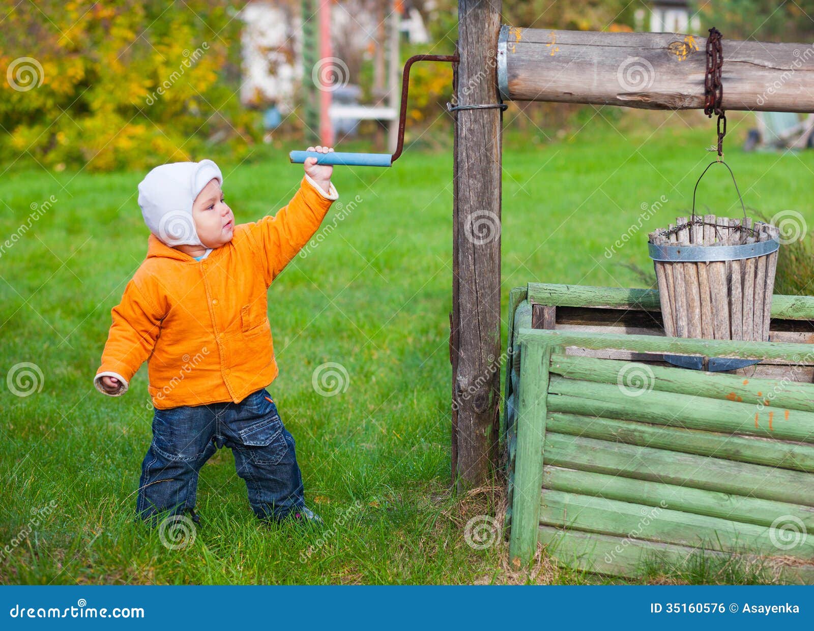 Boy near draw-well stock photo. Image of scenery, event - 35160576
