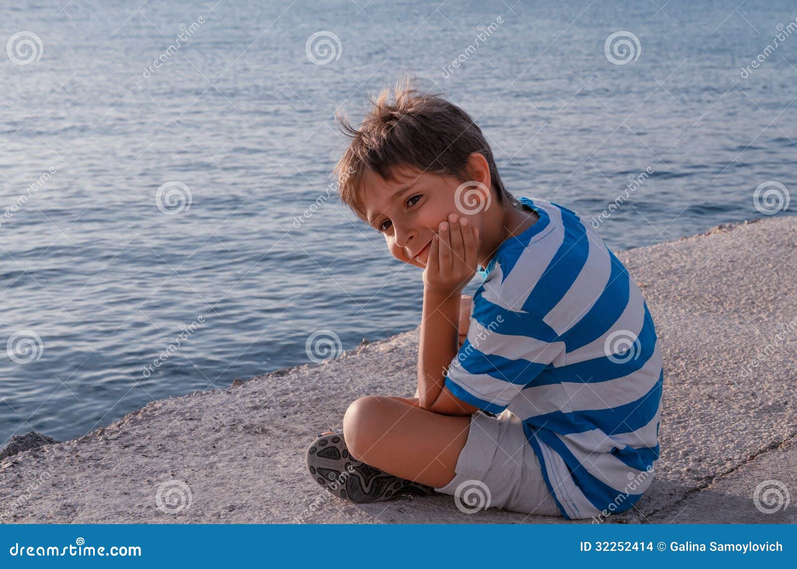 Boy near the sea stock photo. Image of little, waves - 32252414