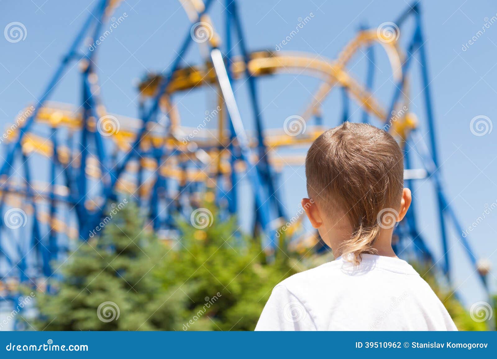 Boy Next To a Roller Coaster Stock Photo - Image of childhood, arcade ...