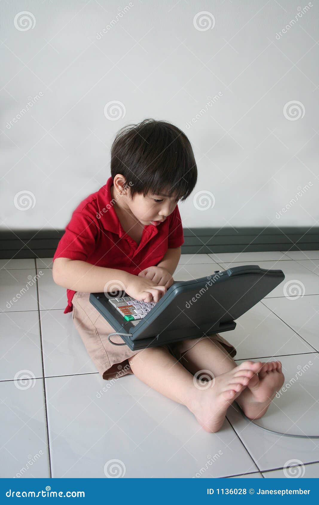Boy & notebook stock photo. Image of play, youth, brothers - 1136028