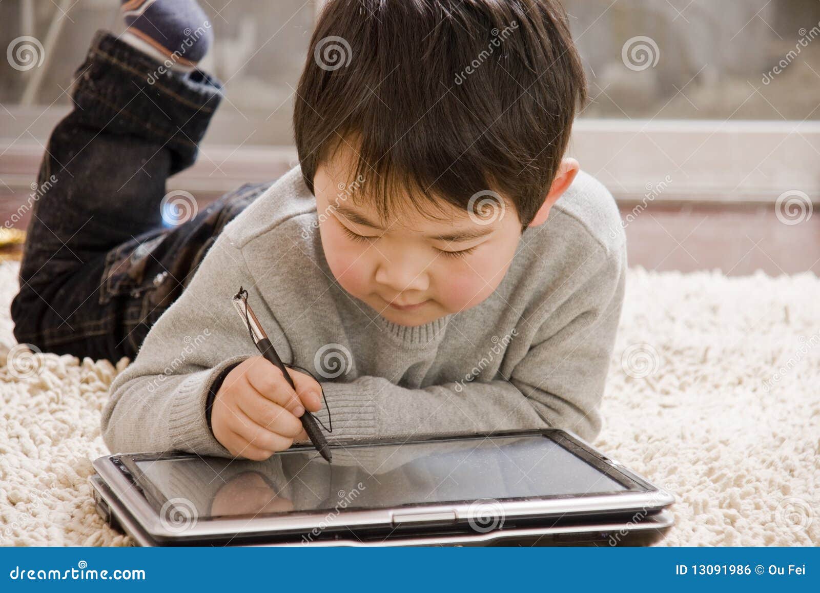 Boy and notebook stock photo. Image of playing, writing - 13091986